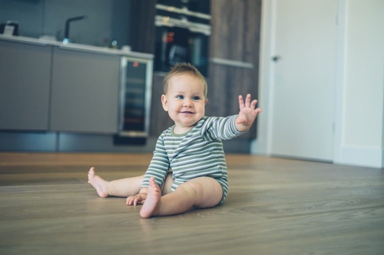 When Do Babies Start to Wave? Baby's Development Milestones