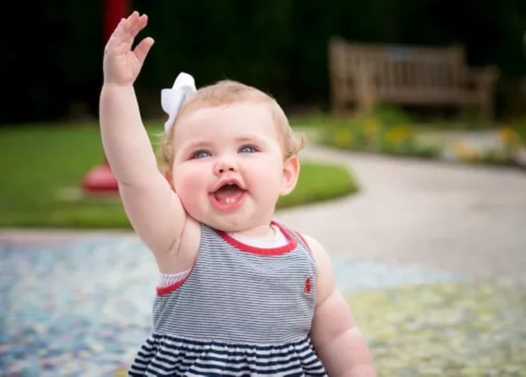When Do Babies Start to Wave? Baby's Development Milestones